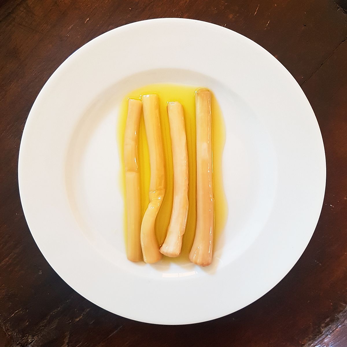 Porro confitat amb herbes aromàtiques, recepta